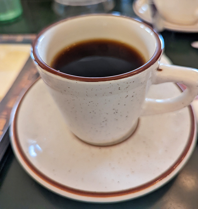Simple coffee in a simple mug&mdash;the unsung hero of every great diner experience. No foam art needed when the coffee itself tells the story.