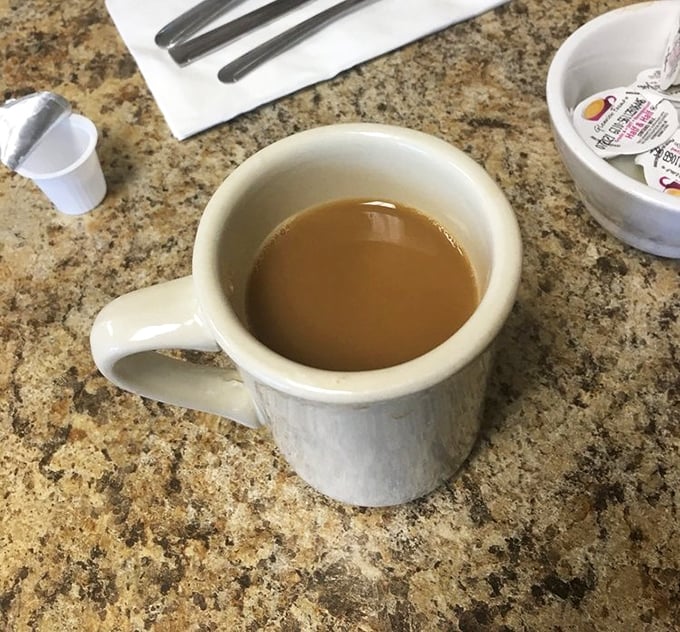 The humble diner coffee mug &ndash; delivering life-saving caffeine with zero pretension. No foam art needed when the coffee's this honest.
