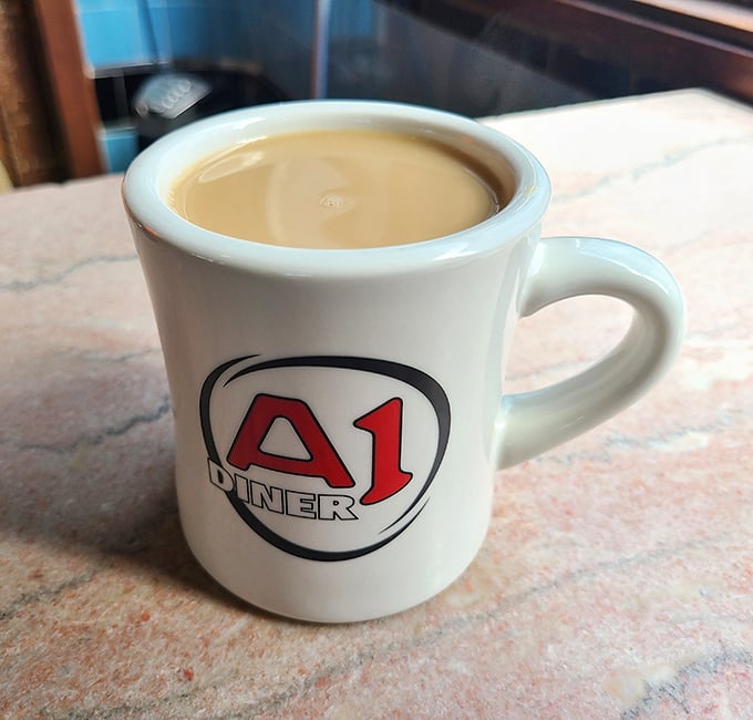 The humble diner mug&mdash;holding liquid ambition since forever. The A1 logo reminds you you're somewhere special, not just anywhere with caffeine.