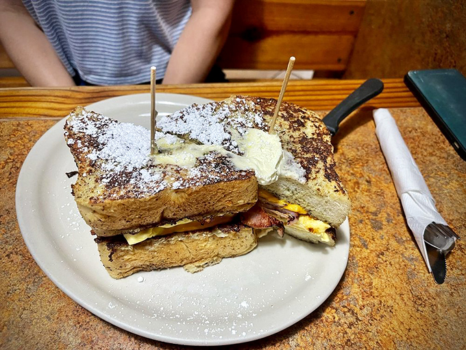 The Cracker Cristo Sandwich brings powdered sugar to the breakfast party, proving that sometimes the best flavor combinations sound wrong but taste oh-so-right.