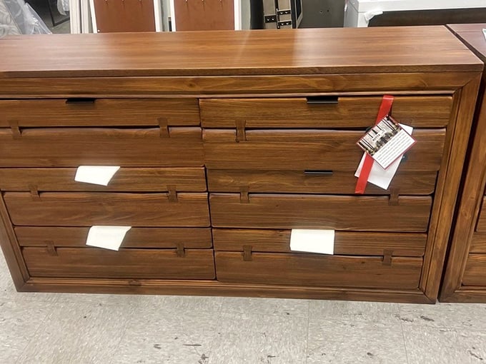 This warm wooden dresser with its distinctive hardware proves that storage furniture can be both practical and handsome.