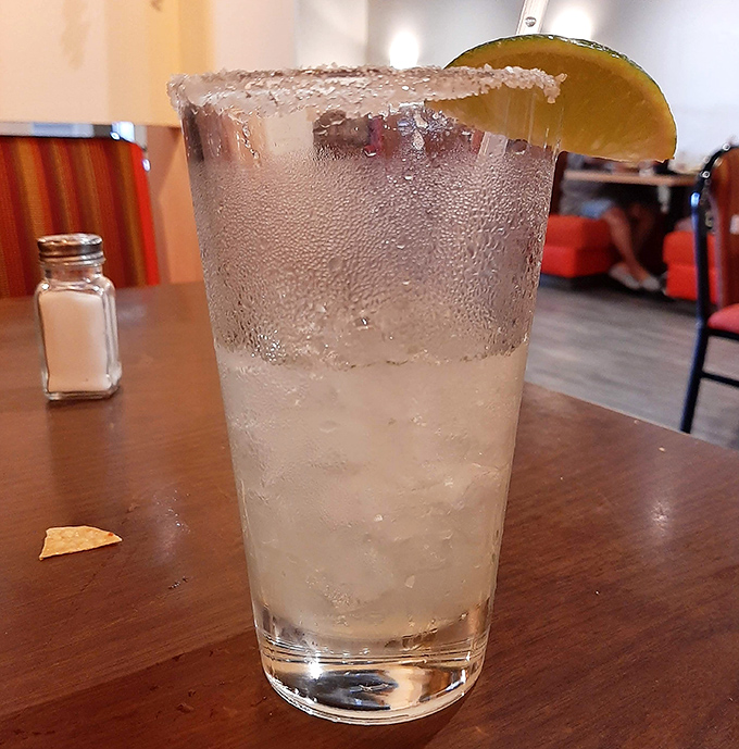 A proper margarita with salt rim &ndash; because sometimes the best vacation is just a sip away.