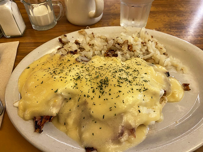 Eggs Benedict that would make the most jaded New Yorker weep with joy &ndash; perfectly poached eggs, real hollandaise, and hash browns crisped to golden perfection.