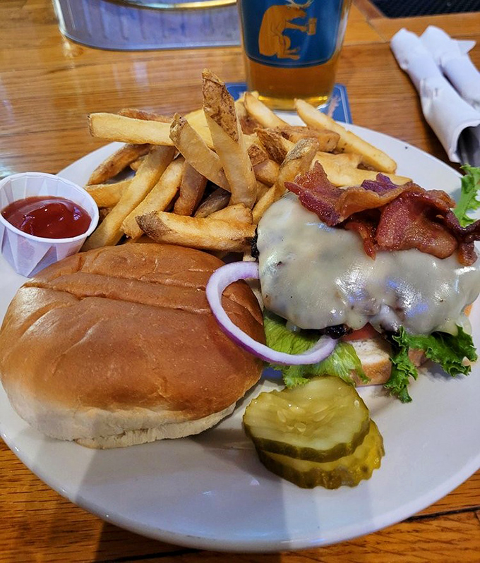 This burger isn't just topped with cheese&mdash;it's crowned with it. The perfect marriage of melty goodness and juicy patty deserves its own wedding song.