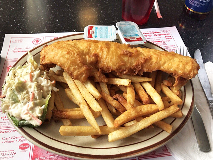 Fish and chips that would make a British pub-goer nod in approval, with a golden batter that shatters at first bite and fries worthy of their supporting role.