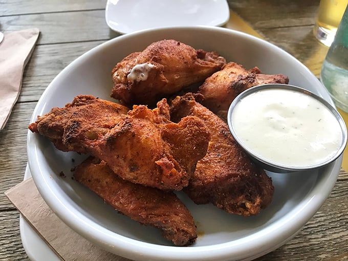 Wings that demand to be eaten with abandon, napkins be damned. The accompanying sauce isn't just a condiment&mdash;it's a flavor amplifier.