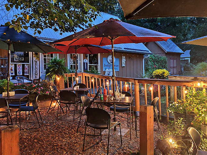 Evening magic at an outdoor caf&eacute; where string lights twinkle like stars and conversations flow as smoothly as the local wine.