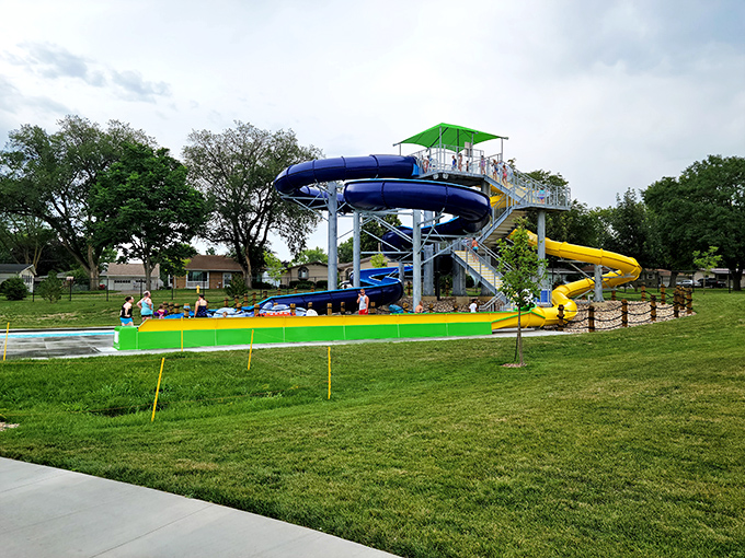 Riverside Park's walking path hugs the Missouri River shoreline, offering the kind of waterfront views that coastal cities charge millions for.
