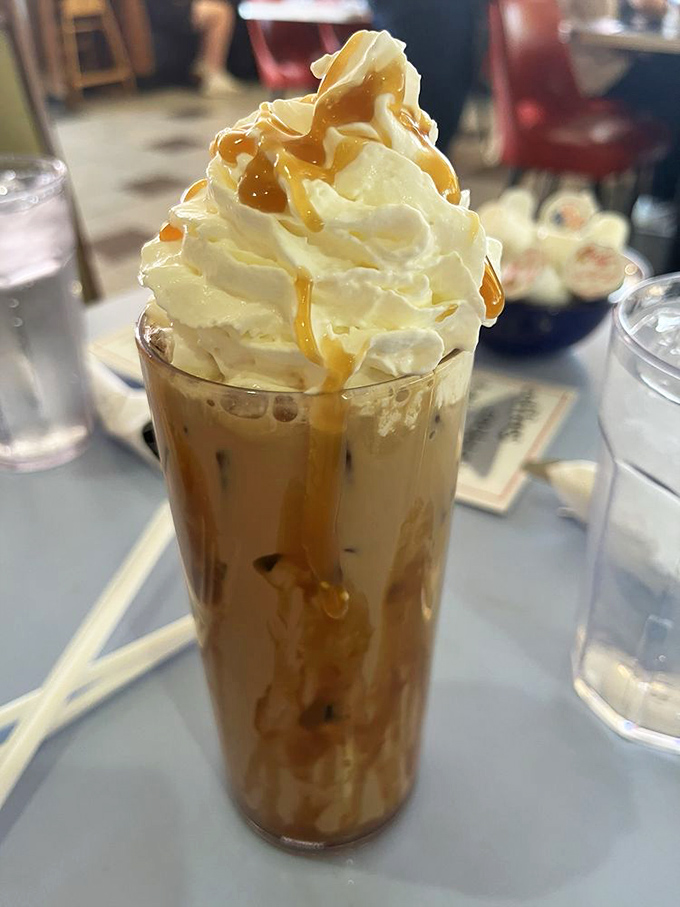 This isn't just coffee&mdash;it's a skyscraper of whipped cream and caramel that makes your regular latte look like it's not even trying.