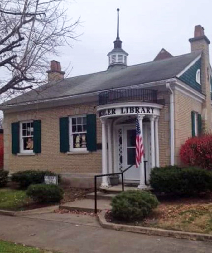 The Knoedler Memorial Library isn't just about books—it's a slice of Americana with its columned entrance and patriotic flair.