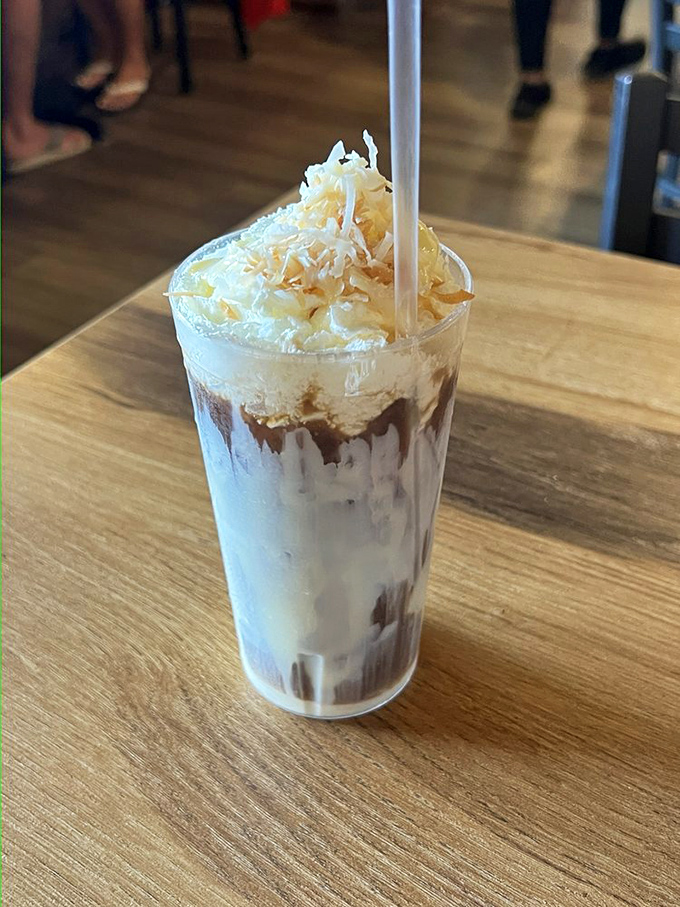 This isn't just coffee&mdash;it's a dessert masquerading as a morning beverage. The whipped cream hat is just showing off.