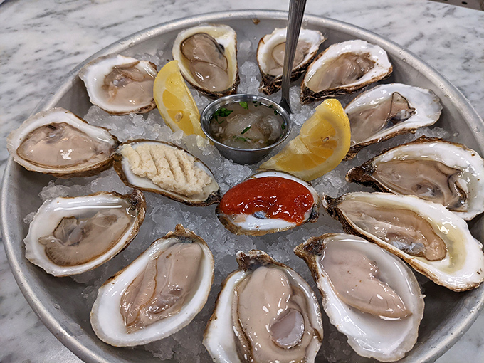 Fresh oysters on the half shell, arranged like jewels on ice with classic accompaniments. Who needs the coast when perfection arrives daily in Fargo?