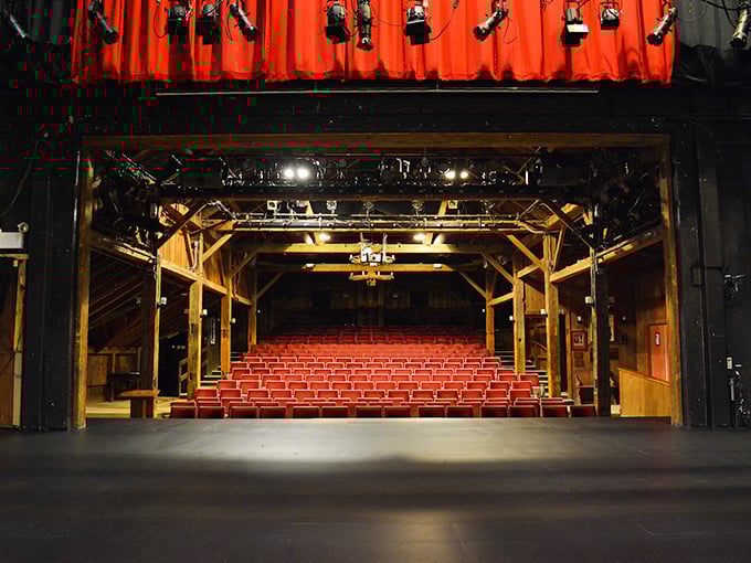 Inside the Peterborough Players' converted barn, theatrical magic happens. Those red seats have witnessed decades of dramatic transformations.