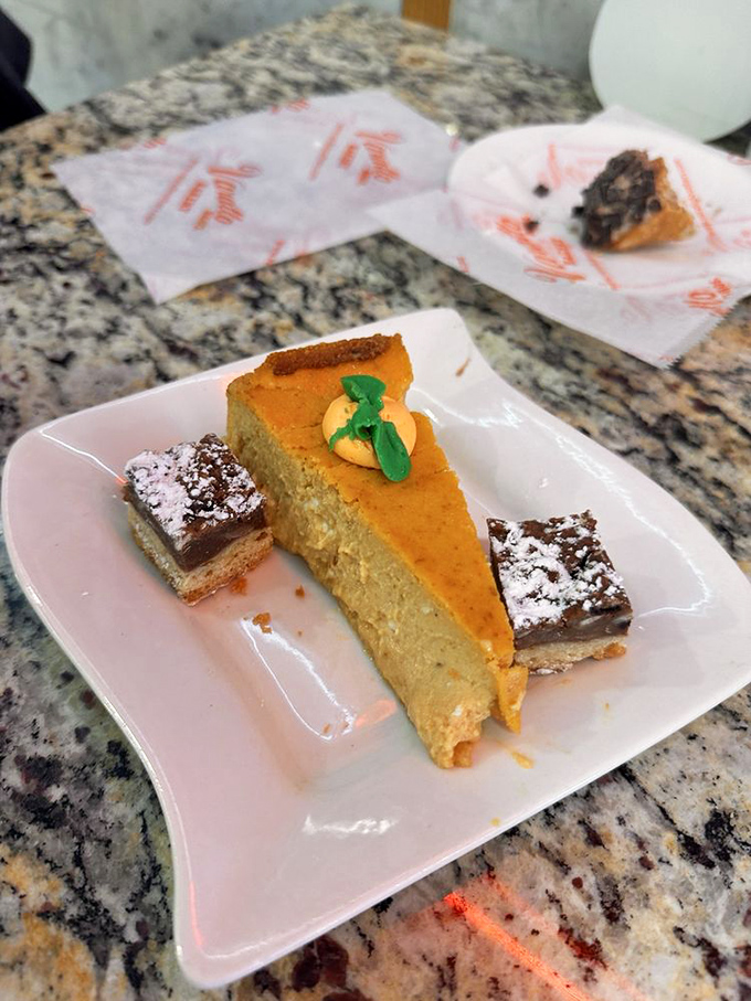 Pumpkin pie and chocolate squares share a plate in perfect harmony &ndash; proof that dessert diplomacy works every time.