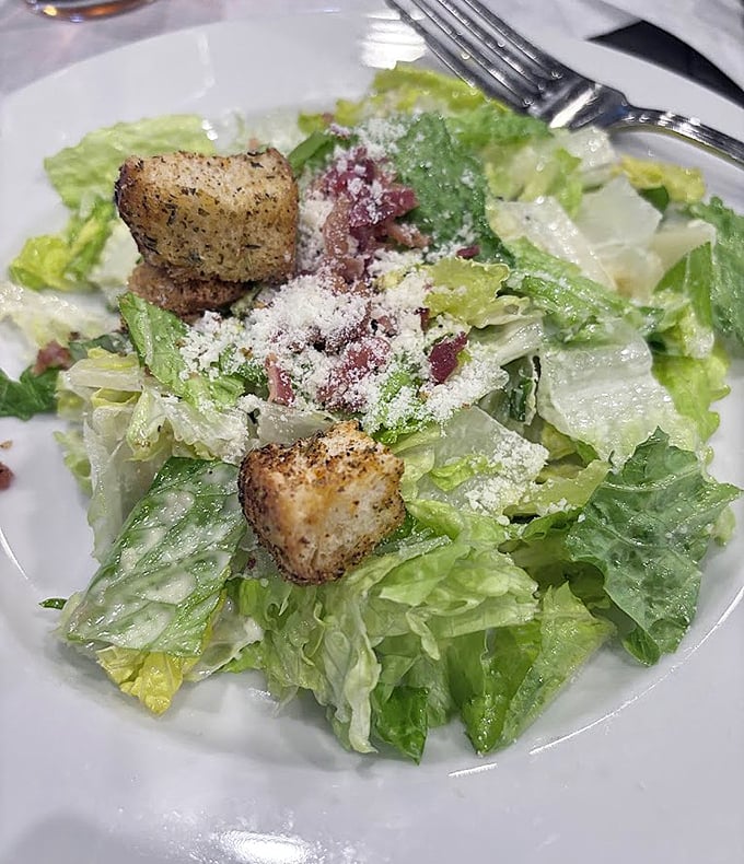 Even the Caesar salad gets the star treatment&mdash;crisp romaine, shaved parmesan, and house-made croutons that crackle with herby goodness.