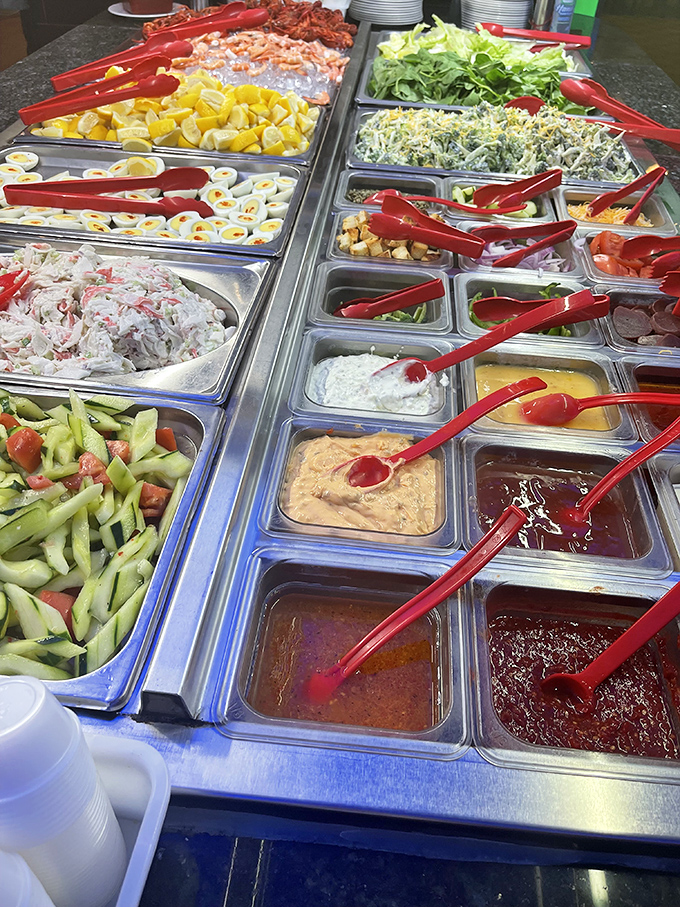 The salad bar &ndash; where good intentions meet reality. That cucumber-tomato combo is the opening act before the main event.