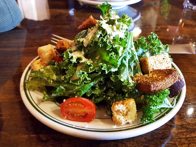 A salad that actually deserves applause&mdash;crisp greens and colorful additions that make you temporarily forget you came for the reindeer sausage.