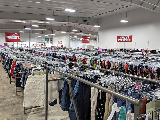 A sea of clothing racks where patience is rewarded with finds that make you wonder, "How did someone give THIS away?"
