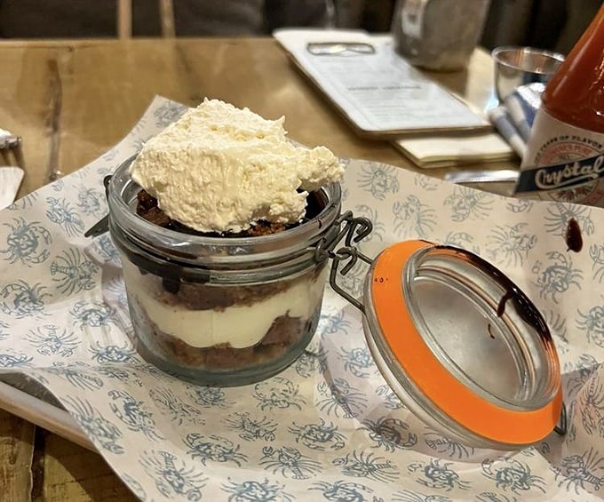 S'mores cheesecake in a jar: childhood campfire memories meet grown-up dessert sophistication. No badges required for this scouting triumph.