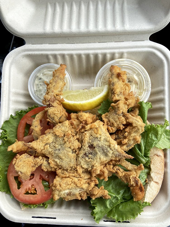 Golden-fried seafood on a fresh roll with crisp lettuce and tomato&mdash;the kind of sandwich that makes you wonder why you'd ever eat anything else.