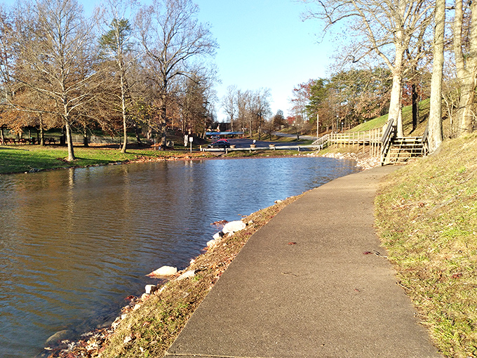 Peaceful pathways wind alongside tranquil waters at Southwood Park. Nature's therapy session costs nothing but delivers priceless moments of serenity.