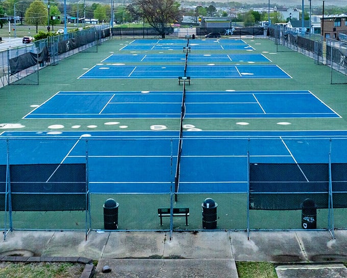 Tennis courts stand ready for matches that won't cost you a country club initiation fee to access.