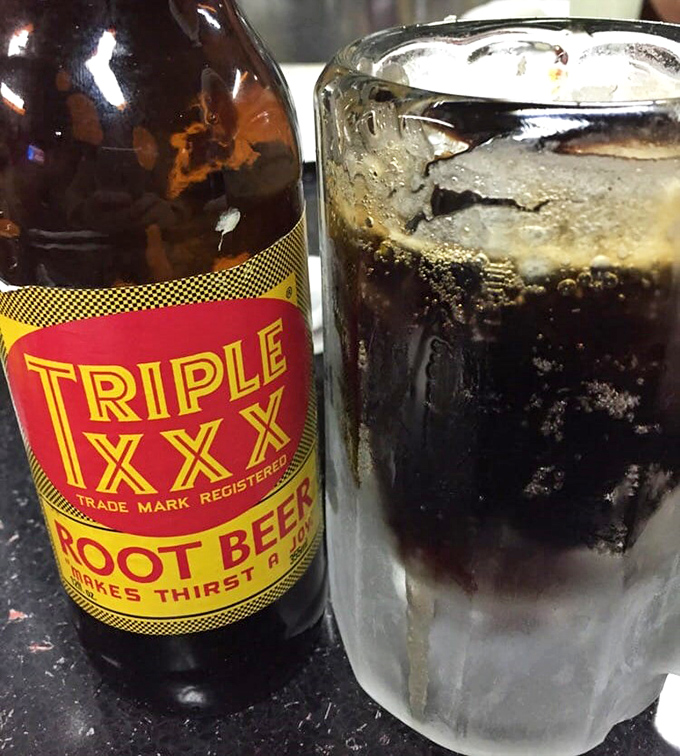 Triple XXX Root Beer served in a frosted mug&mdash;the kind of nostalgic sip that makes you wonder why we ever complicated beverages with energy infusions and activated charcoal.
