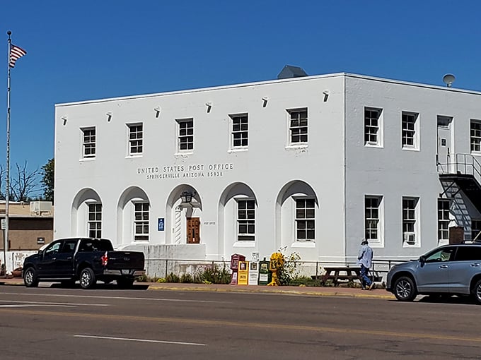 Springerville's historic Post Office stands as a gleaming white testament to when sending mail was an event and architecture had presence.