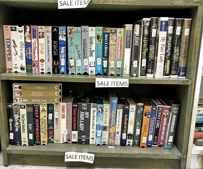 The VHS section&mdash;where "be kind, rewind" wasn't just a suggestion but a social contract. Physical media that outlasted the machines that played them.