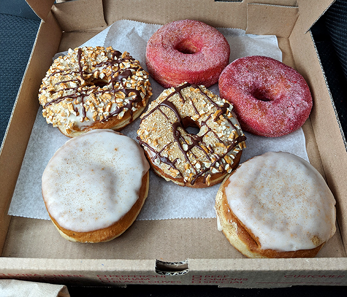 Opening this box is like discovering treasure&mdash;six perfectly crafted vegan donuts in a symphony of textures and flavors that make sharing an act of true friendship.
