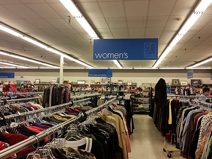 Women's clothing racks overflow with possibilities, where designer labels hide among everyday wear like Easter eggs waiting discovery.