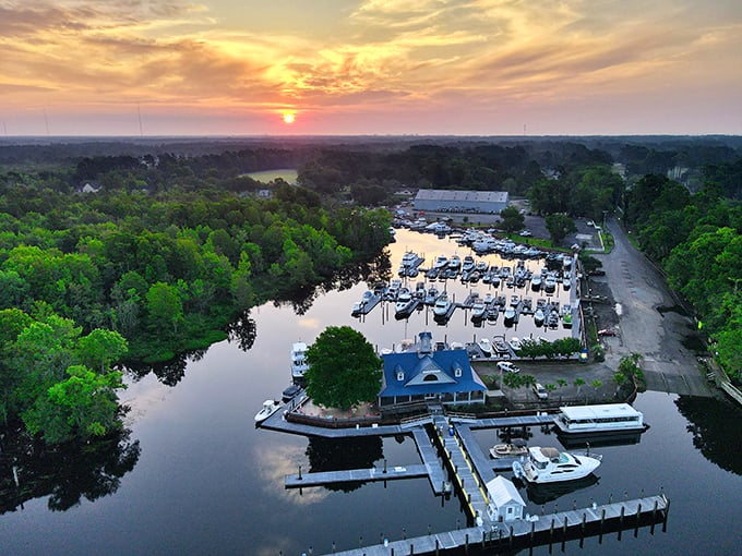 A sunset marina scene that looks like it belongs in a travel magazine, complete with perfectly mirrored reflections.