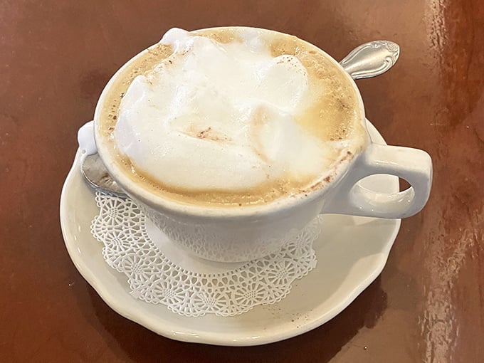 This isn't just coffee&mdash;it's a frothy work of art served on a doily. The kind of cappuccino that makes you want to linger and contemplate life's mysteries.