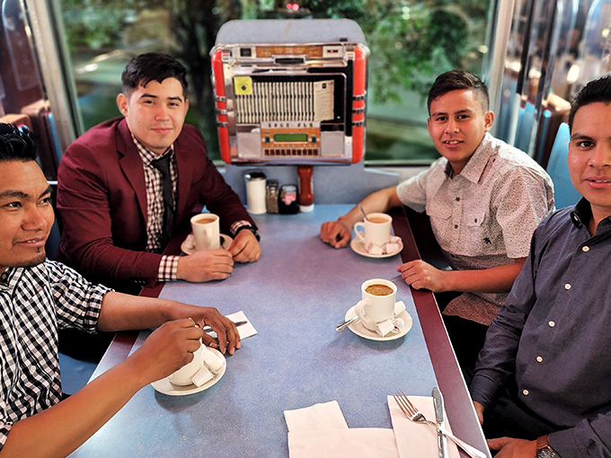 Coffee and conversation&mdash;the twin pillars of diner culture where strangers become friends over bottomless cups of liquid motivation.