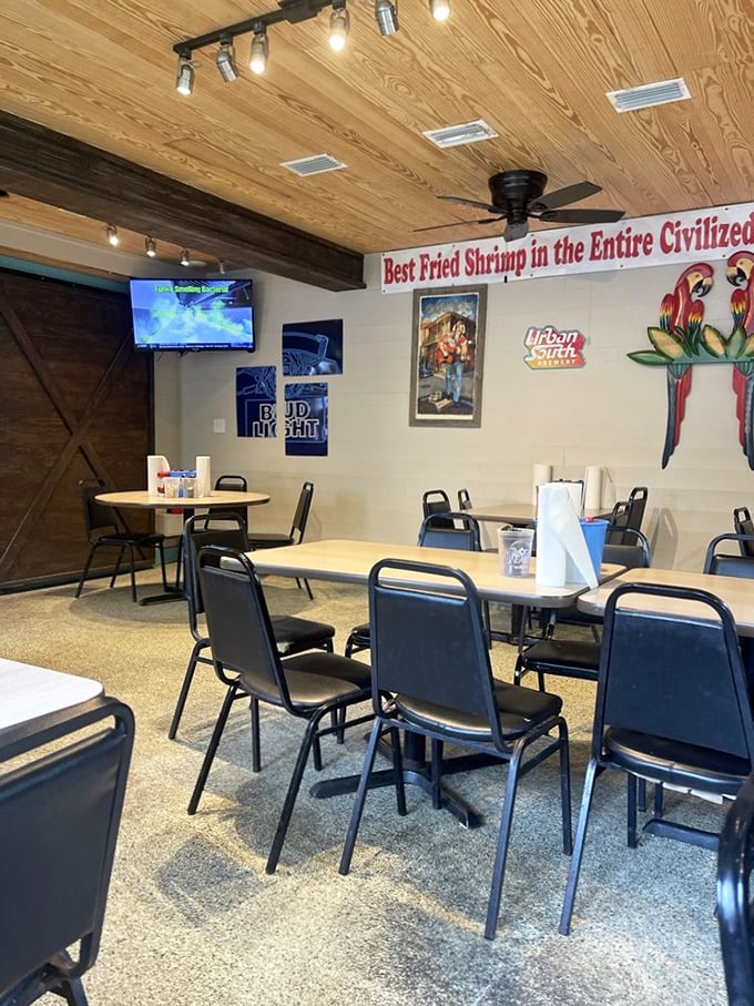 No white tablecloths or pretentious waitstaff here—just wooden ceilings, simple tables, and that famous slogan reminding you why you came.