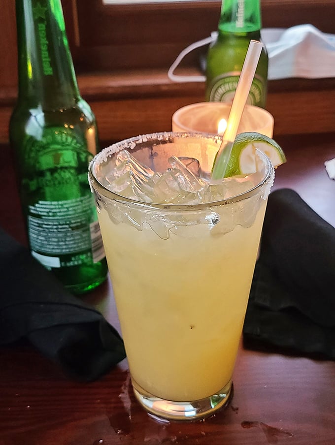 A sunshine-yellow margarita with a salted rim stands ready to wash down seafood treasures, proving that even cocktails dress up for dinner at The Anchor.
