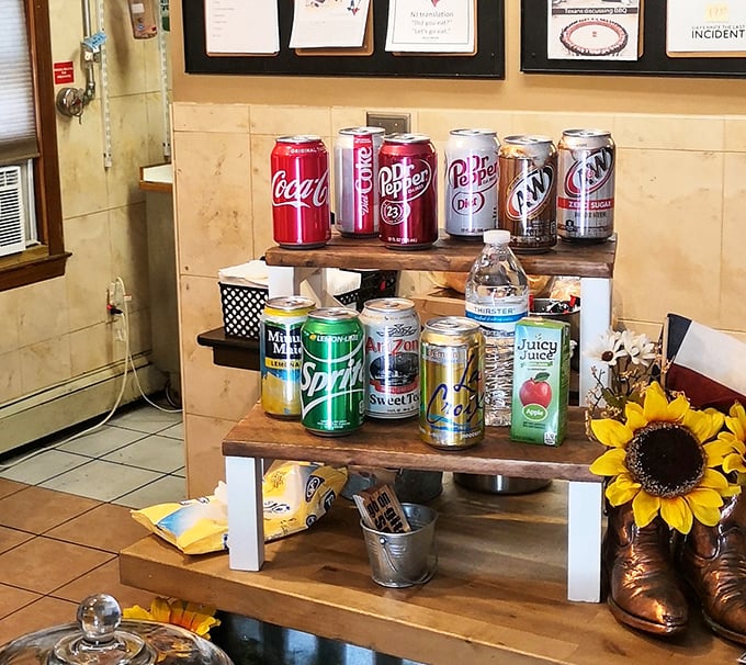 The beverage station&mdash;where sweet tea and soda stand ready to cool the fire of perfectly spiced barbecue in a boot-shaped sunflower vase.
