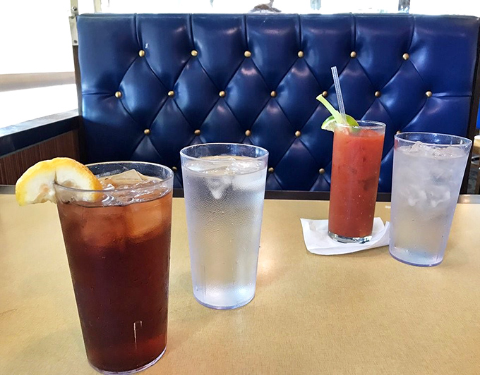 The beverage lineup includes what appears to be iced tea and a Bloody Mary&mdash;because sometimes you need caffeine, sometimes you need vegetables disguised as cocktails.