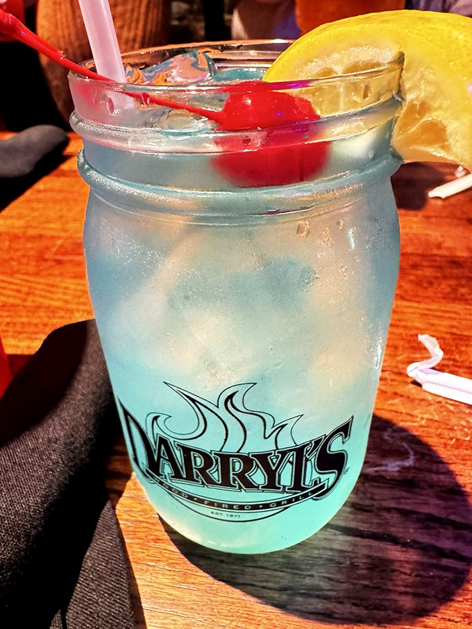 A blue drink that matches the Carolina sky, served in a mason jar because, well, this is the South after all. Those cherries are the exclamation points of refreshment.