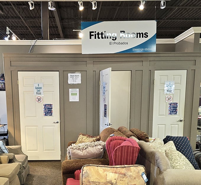 "Fitting Rooms/El Probados"&mdash;where fashion dreams get their reality check. The universal experience of hoping something fits is multilingual.