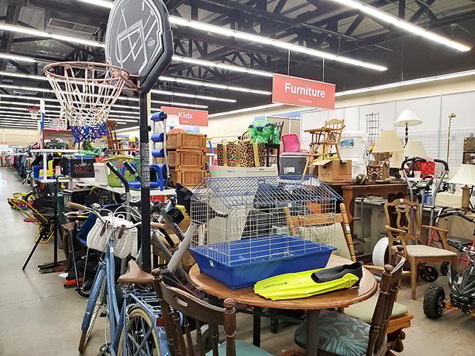 The furniture section&mdash;where mid-century finds mingle with practical pieces. That basketball hoop has stories to tell.