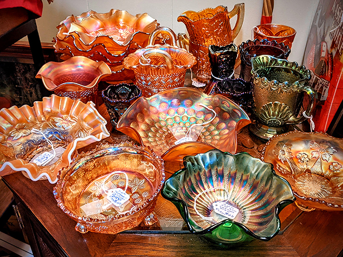 Carnival glass catches light like memories&mdash;iridescent, colorful, and impossible to replicate. Each piece tells stories of elegant dinner parties from decades past.