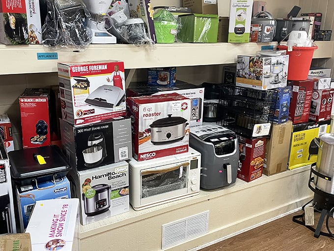 Kitchen appliance purgatory: where barely-used wedding gifts and impulse purchases await their culinary redemption.