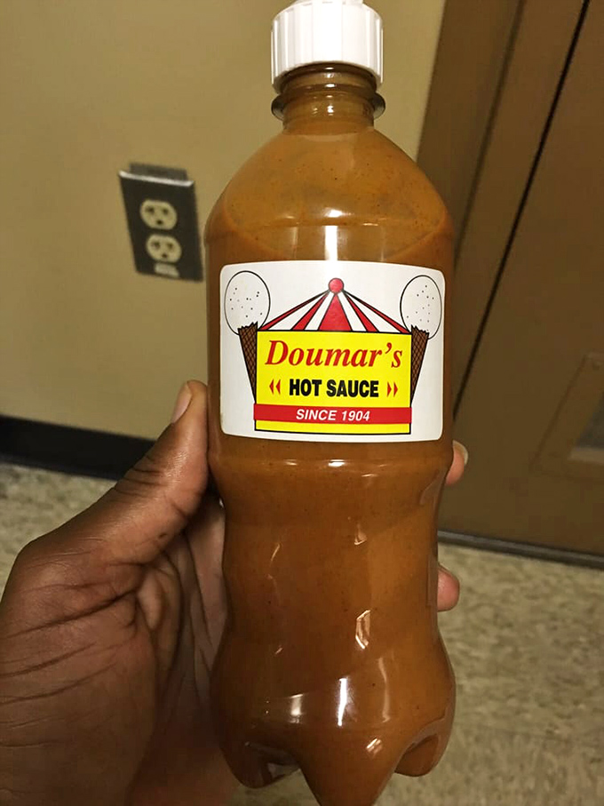 Doumar's hot sauce bottle doesn't need fancy packaging&mdash;what's inside has been keeping taste buds dancing since 1904.