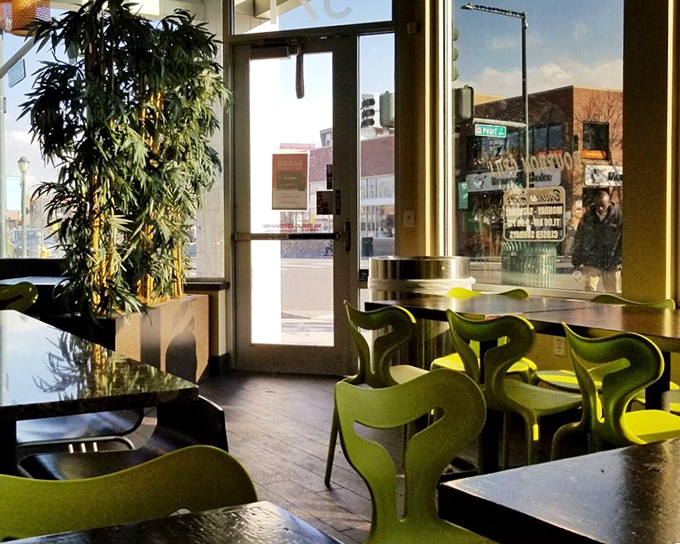 Sunshine streams through windows illuminating what might be Denver's most honest dining room. No pretense, just good food and those signature green chairs.