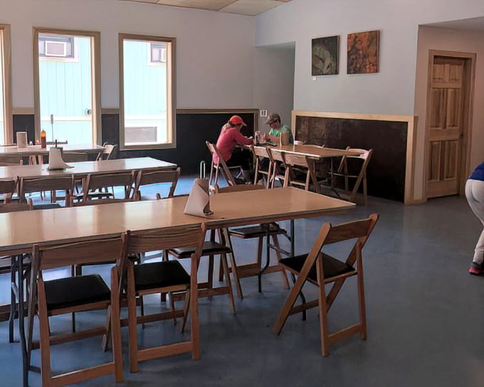 Simple wooden tables and chairs say, "Stay awhile, but not too comfortably." Perfect for the eat-and-retreat crowd with mountains to conquer.