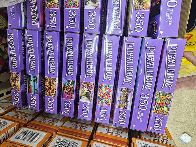 Purple puzzle paradise! Each box contains 350 pieces of affordable escapism&mdash;mental vacations that cost less than the gas to drive there.