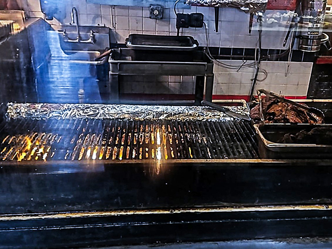 Behind the scenes magic: where steaks meet fire and transformation happens. The grill master's domain is a smoky theater of delicious anticipation.