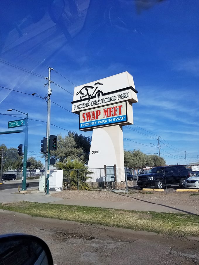 The iconic sign at 38th Street marks the spot where weekend treasure hunters have gathered for decades, a Phoenix landmark of commerce and community.