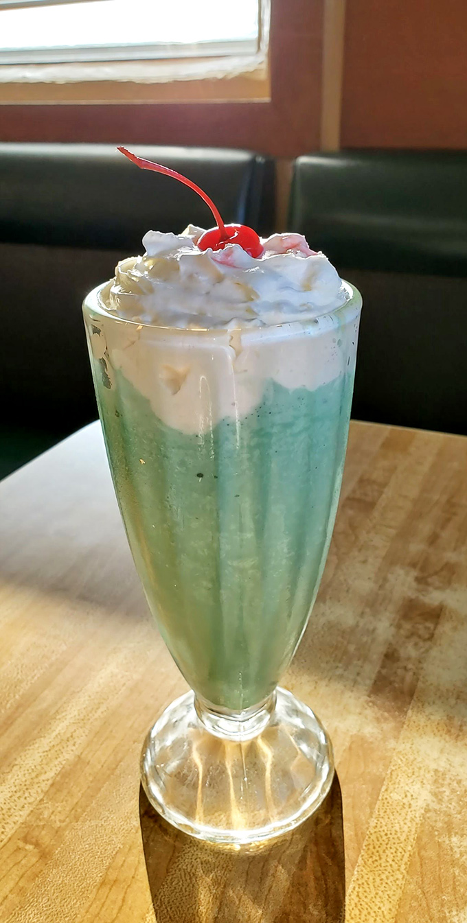 That mint green milkshake topped with whipped cream and a cherry isn't just a drink&mdash;it's dessert with a straw and zero regrets.